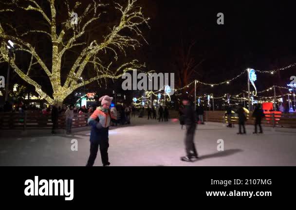 Vienna, Austria - December 13, 2024: Evening view of Rathaus Park and ...