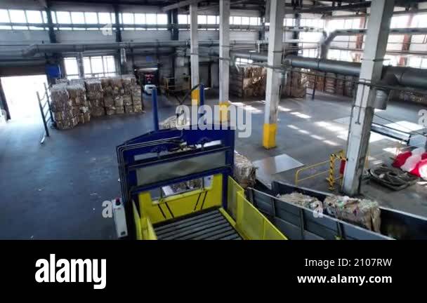 Warehouse of cardboard factory for storing raw materials. Transport ...