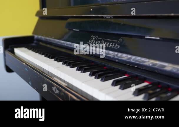 Vintage piano keyboard reveals perfect shape closeup. Contrasting tones ...