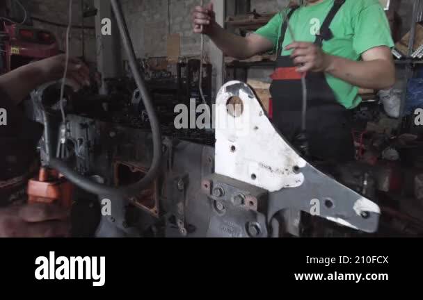Diesel Engine Overhaul and Rebuild. Repair of the tractor engine Stock ...
