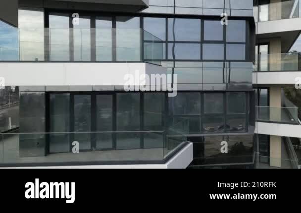 A multi-story building showcases contemporary architecture with ...