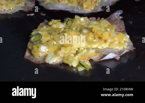 chicken Mataba in cooking process in street food restaurant. It will be ...