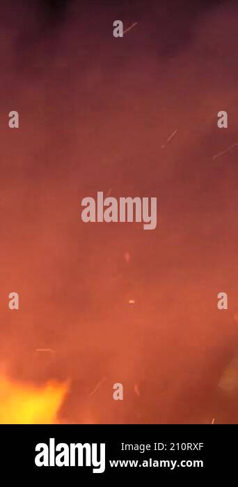 the fire blazes on, casting a mesmerizing glow and radiating intense ...