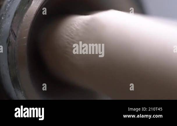 Special cylinder processes paper material to form shape. Industrial ...