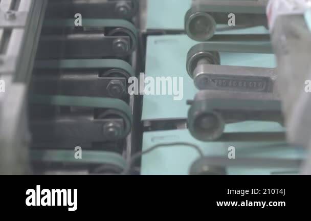 Conveyor line for production of cardboard packaging. Active mechanism ...