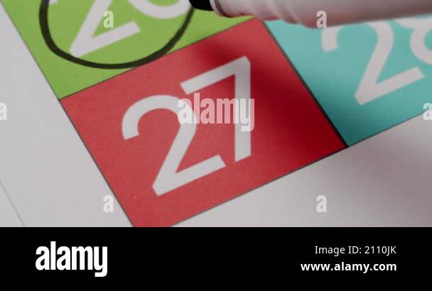 Close-up photograph of a colorful calendar with the number 22 ...