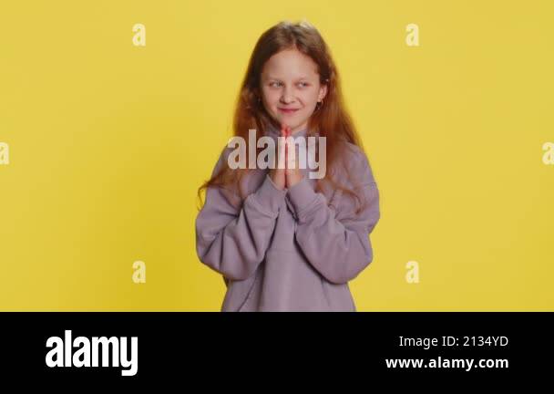 Sneaky cunning preteen child girl kid with tricky face gesticulating ...