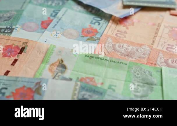 Malaysian ringgit banknotes displayed flat showing various ...