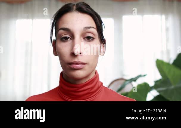 Young woman displaying a fear facial expression in slow motion ...