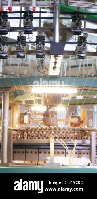 Vertical, Weaving of fabric on cars. Production of fabric from threads ...