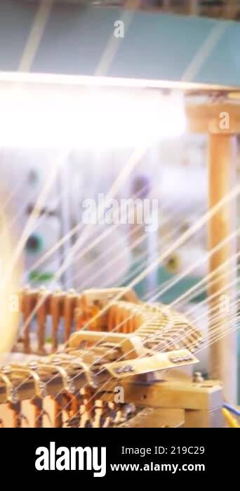 Vertical, Weaving of fabric on cars. Production of fabric from threads ...