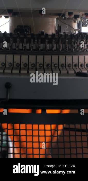 Vertical, Weaving of fabric on cars. Production of fabric from threads ...