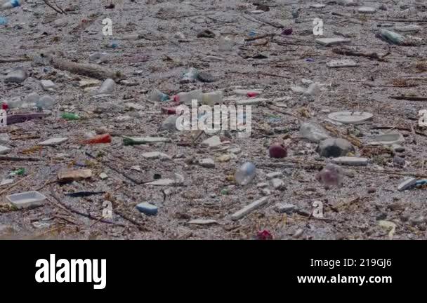 Heaps of Garbage Thrown into the Water by People on the Ocean Beach ...