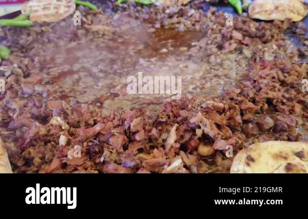 Traditional Turkish Lamb Roast Cooking on a Hot Plate Footage Stock ...