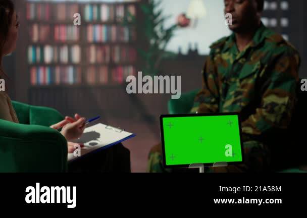 Military soldier experiences shell shock at counseling next to copy ...