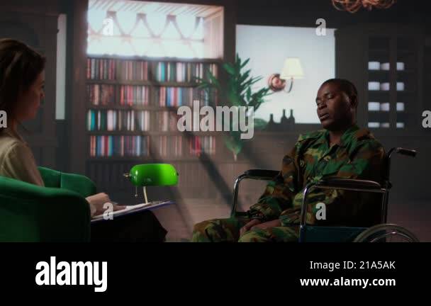Black army soldier in wheelchair is a war survivor and deals with shell ...