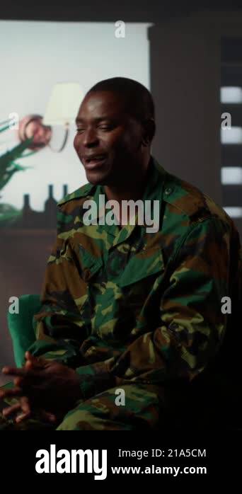 Vertical Video Counselor offering support to war veteran during therapy ...