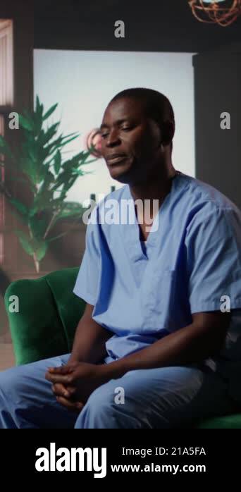 Vertical Video Nurse experiences emotional stress sitting in a ...