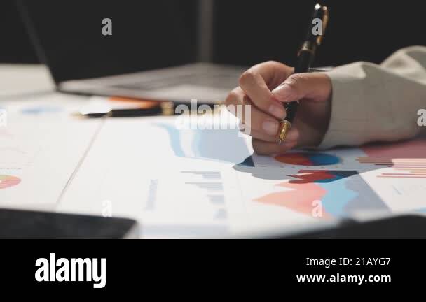 businessman hand pointing on paper on the table. concept of business ...