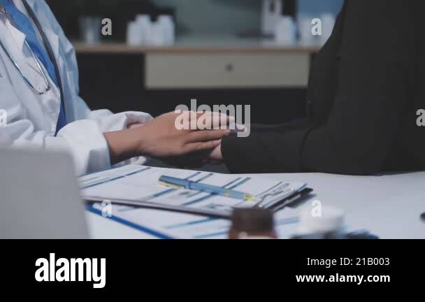 doctor and nurse shaking hands Stock Video Footage - Alamy