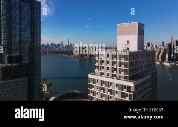 Aerial views capture the East River and residential buildings with ...