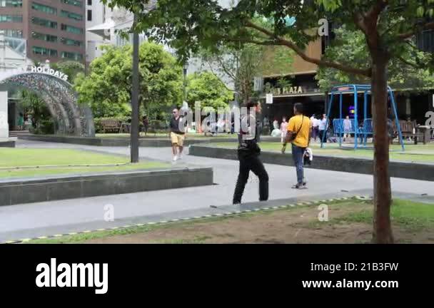 Singapore- 11 Dec 2024: View of Raffles place subway entrance building ...