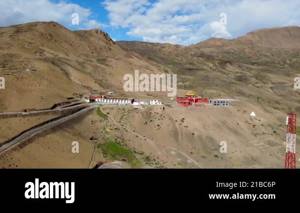 An aerial view of komic village with beautiful himalaya mountains and ...