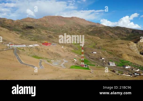 An aerial view of komic village with beautiful himalaya mountains and ...