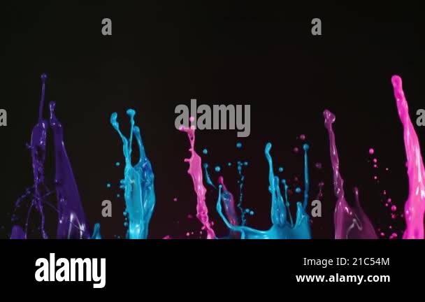 Super slow motion of dancing colors shapes isolated on black background ...