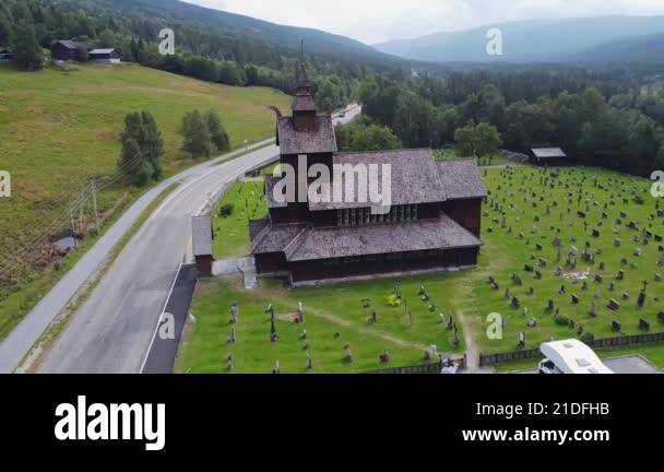 Explore the historic Norway Udval Stave Church surrounded by lush ...