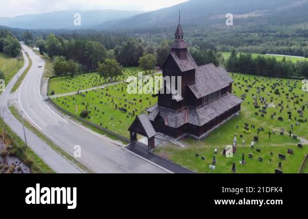 Explore the historic Norway Udval Stave Church surrounded by a tranquil ...