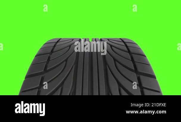 4k Resolution Video: Black Wheel Tyre Seamless Loop Rotating on a Green ...