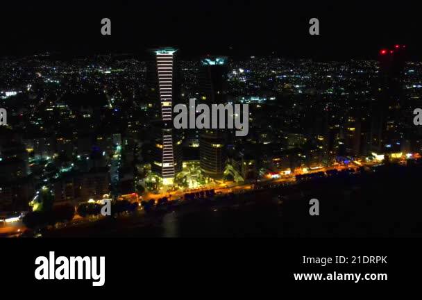 Night city views. Aerial exploration of Limassol's illuminated urban ...
