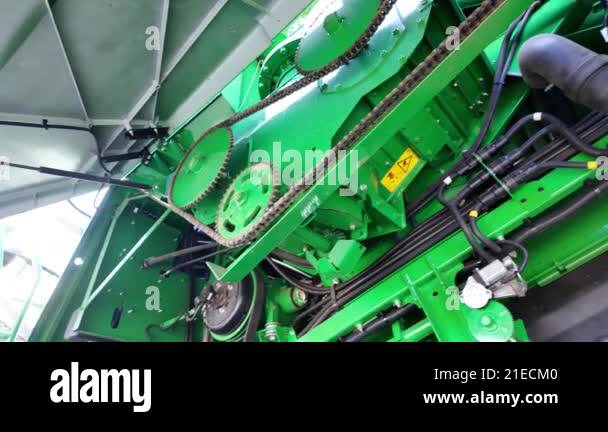 Mechanism inside a new combine harvester Stock Video Footage - Alamy