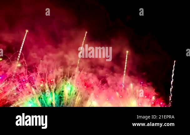 4K. loop seamless of real fireworks background golden shining fireworks ...