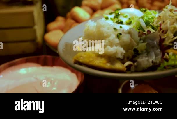 Korean cheese toppoki and Chinese oil dry noodles served with deep ...