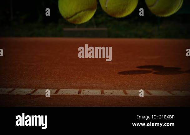 Super Slow Motion of Jumping Tennis Balls Out of Line. Low Depth of ...