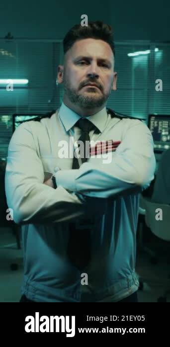 Medium vertical portrait of serious middle-aged Caucasian male army ...