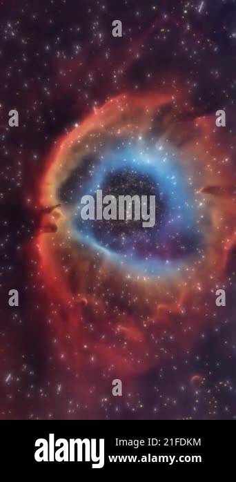 Witness the stunning display of the Helix Nebula as its vivid colors and intricate details are ...