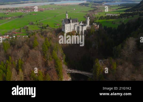 Aerial view Neuschwanstein Castle and bridge Marienbrucke across Pollat ...