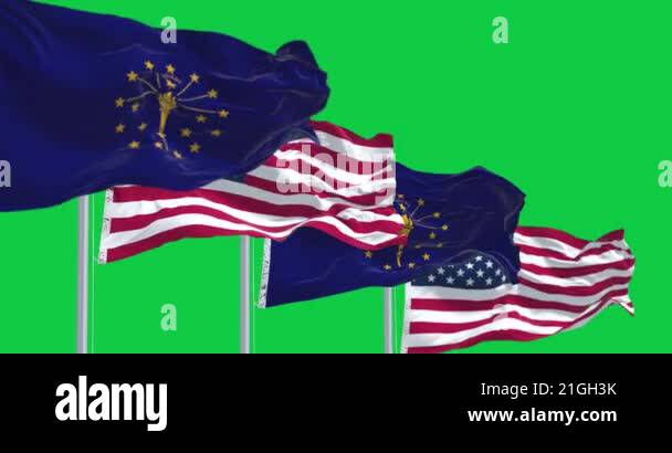 Indiana state flags waving with the national flag of the United states ...