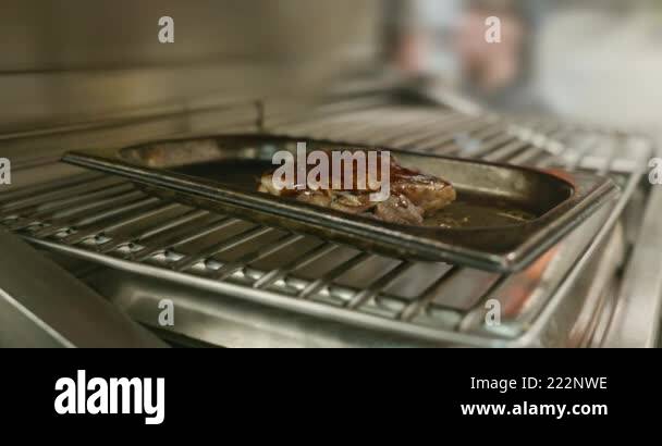 Process of Preparation of Meat Dishes by Chef Cook at Restaurant ...