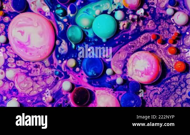 This captivating abstract image showcases colorful liquid patterns and ...