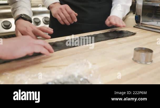 Men Cook Prepare Ravioli at Restaurant. Slow motion 60fps 4K 10-bit ...
