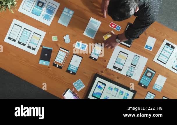 Top view of software developer working on Ux Ui design while team working together to brainstorm ...