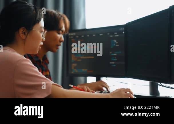 Back End Software Developer Engineer For Computer Programming Working Together On Debugging