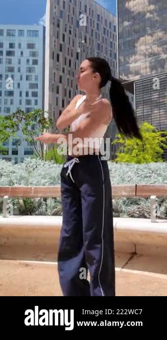 Talented dancer showcases fluid movements in a dynamic outdoor ...