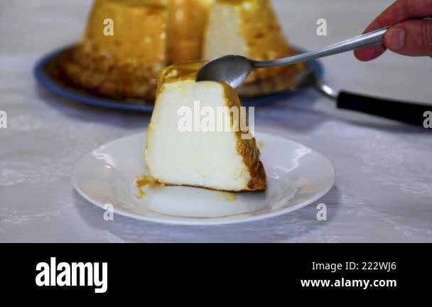 Traditional caramelized egg white pudding known as molotof Stock Video ...
