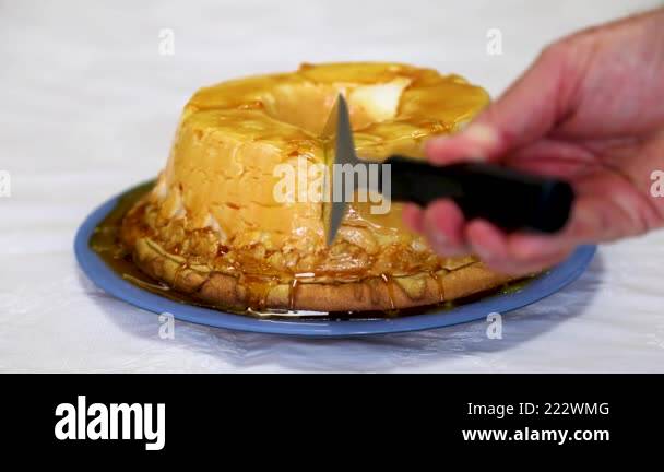 Traditional caramelized egg white pudding known as molotof Stock Video ...