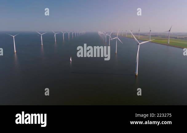 Experience the beautiful Dutch coastline, where windmill turbine farms ...